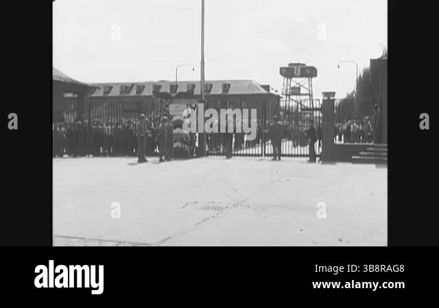 GERMANY - 1945 - Russian children march through gates of a Displaced ...
