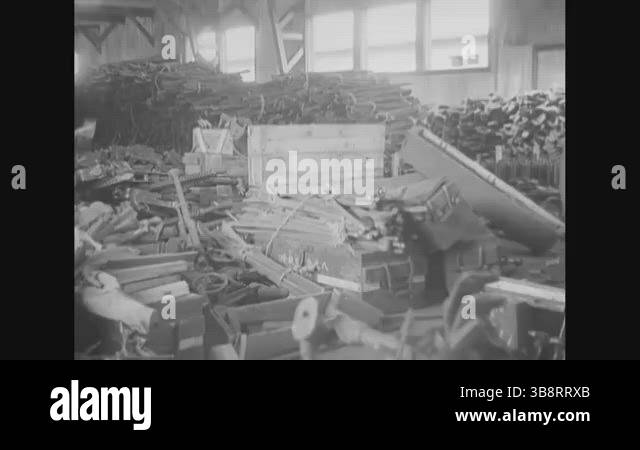 KAMAKURA - 1945 - 221st Division soldiers inventory stacks of captured ...