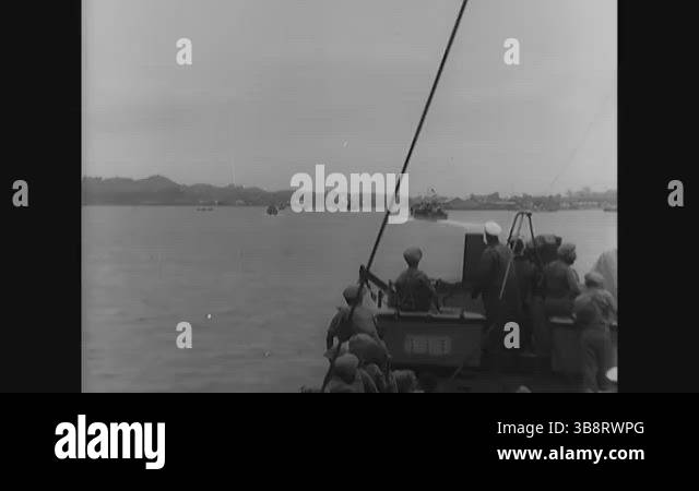 SINGAPORE - 1945 - 5th Indian Regiment soldiers disembark a ship, and ...