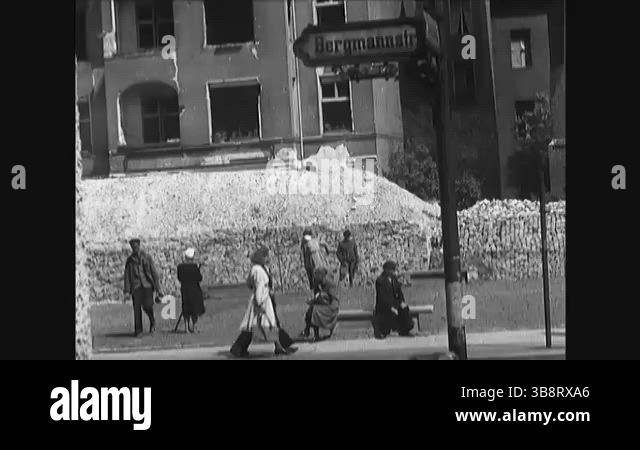 GERMANY - 1946 - Civilians clear rubble with power shovel in Heidelberg ...