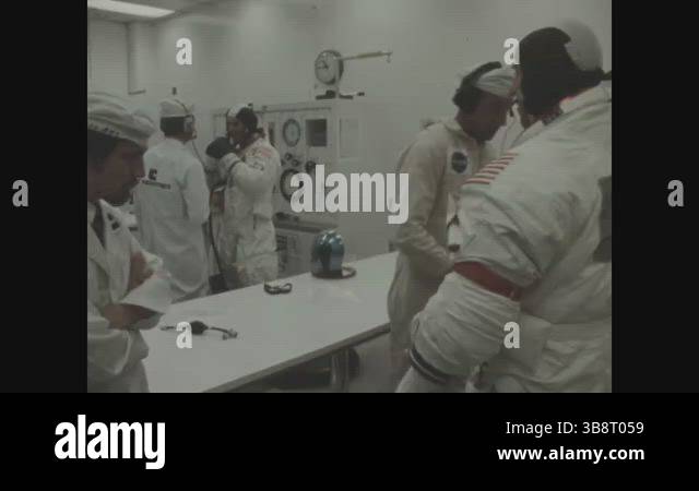 MERRITT ISLAND - 1970 - NASA scientists monitor the suits of astronauts Jim Lovell, Fred Haise ...