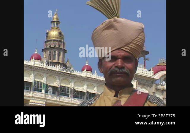 INDIA - 1999 - Pan of soldiers standing outside India's Mysore Palace ...