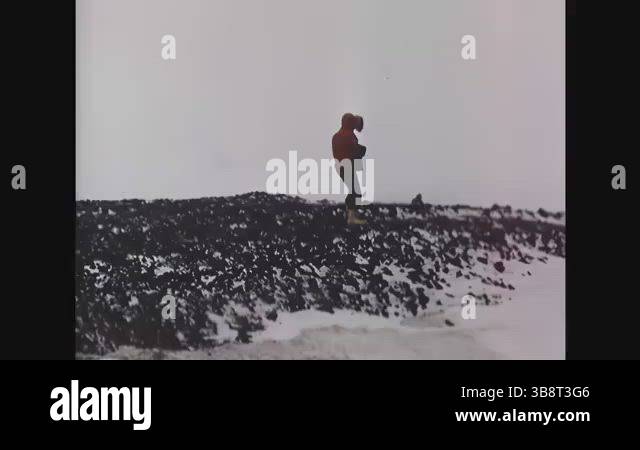 ANTARCTICA - 1960 - A man captures photographs of explorers and the ...