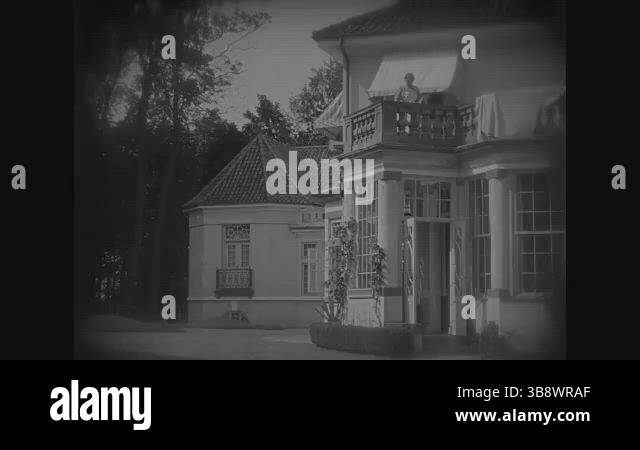 DENMARK - 1924 - in this silent comedy, a housekeeper shakes out a ...