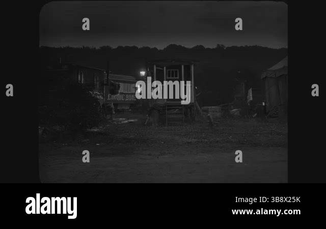 FRANCE - 1926 - in this silent romance, a couple arrives at a circus trailer in the evening ...