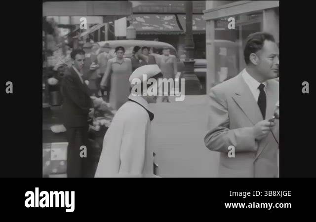 SAN FRANCISCO - 1952 - A newsman interviews a woman on the street who feels that international ...
