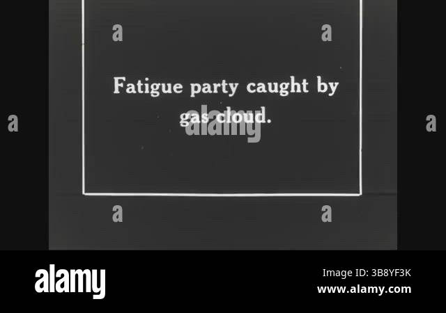 EUROPE - 1918 - A fatigue party digging a US Army trench stops to don ...