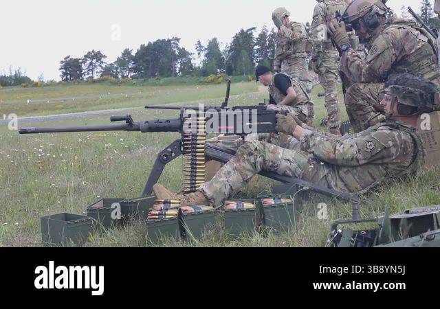 GERMANY - 5.23.2024 - American soldiers fire machine guns on a shooting ...