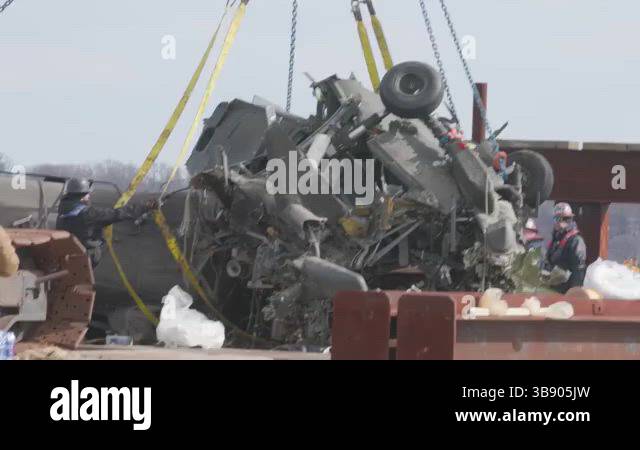 WASHINGTON DC - 2.4.2025 - NTSB and FBI investigators use a barge and ...