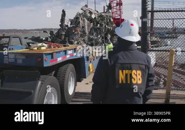 WASHINGTON DC - 2.4.2025 - NTSB and FBI investigators use a barge and ...