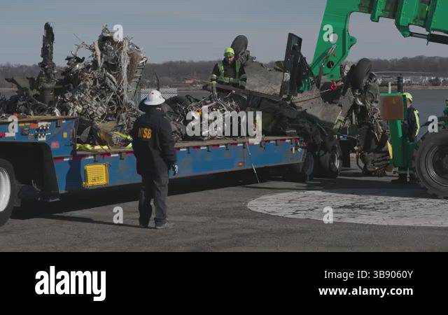 WASHINGTON DC - 2.4.2025 - NTSB and FBI investigators use a barge and ...