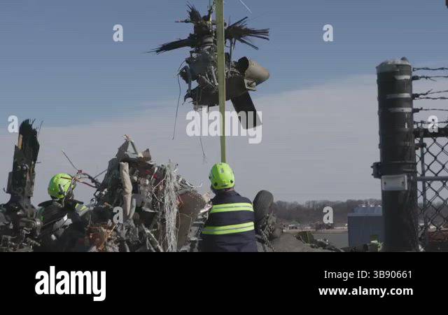WASHINGTON DC - 2.4.2025 - NTSB and FBI investigators use a barge and ...