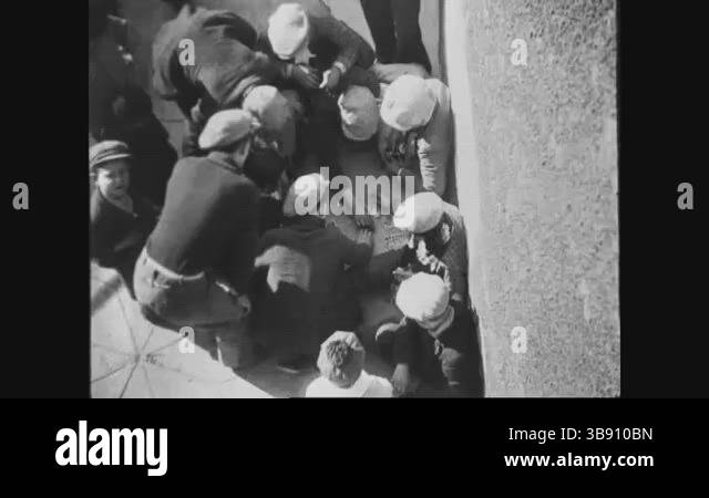 NICE - 1930 - Working class men and boys play card games and rock-paper ...