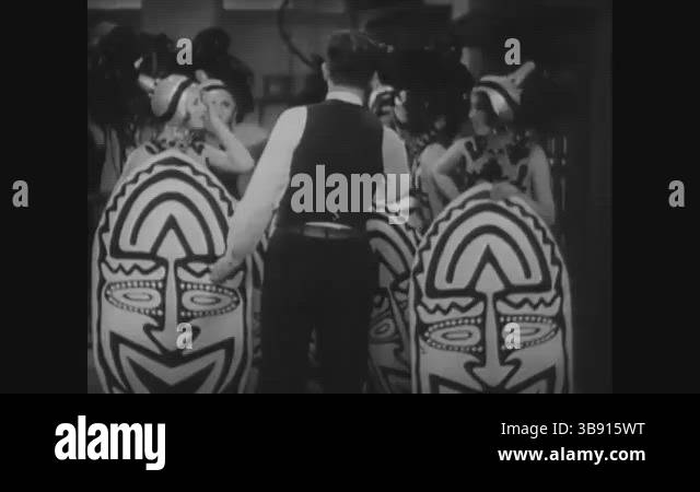 US - 1929 - in this musical, some men are talking to a showgirl. Her ...