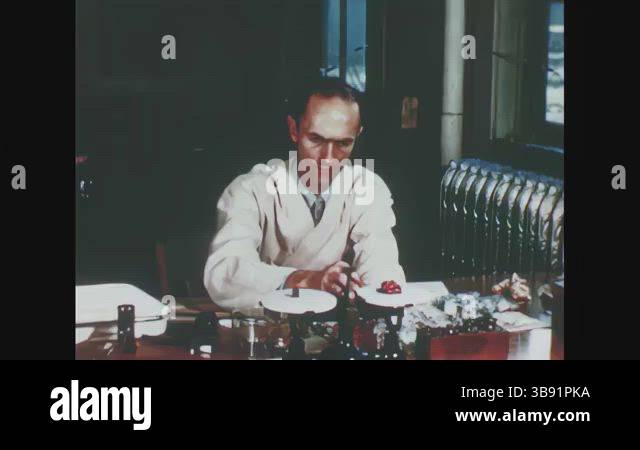 UNITED STATES - 1940s - Scientists use microscopes to study the ...