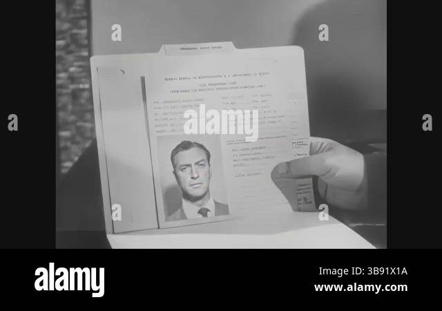 BERLIN - 1952 - An American general looks at the dead agent's file and ...