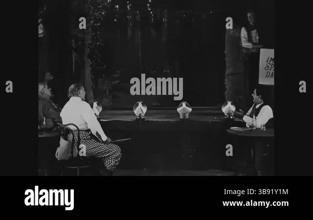 US - 1929 - in this silent western, people are enjoying a show with ...