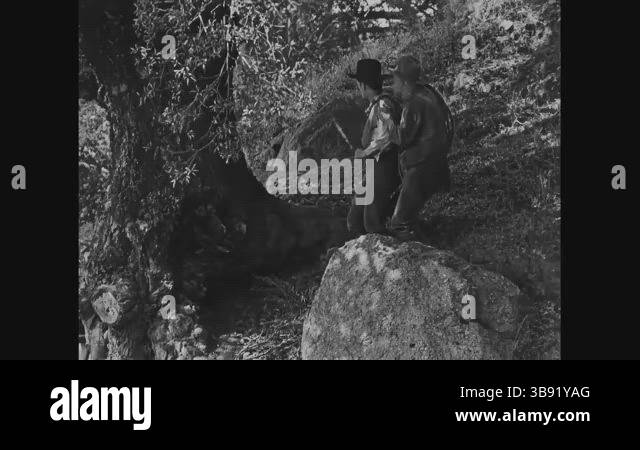 US - 1929 - in this silent western, two cowboys capture a bandit and ...