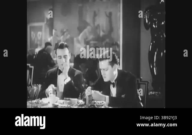 US - 1929 - in this drama, two men are talking in a restaurant. One of ...