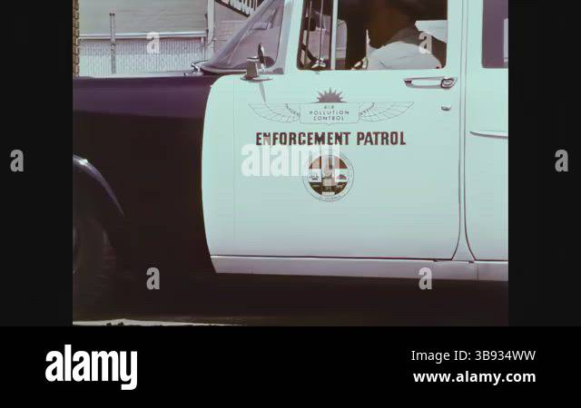 UNITED STATES - 1977 - An Air Pollution Control officer inspects a ...