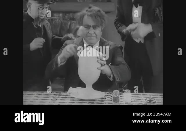 USA - 1928 - In this silent comedy, people try various tools to pry ...