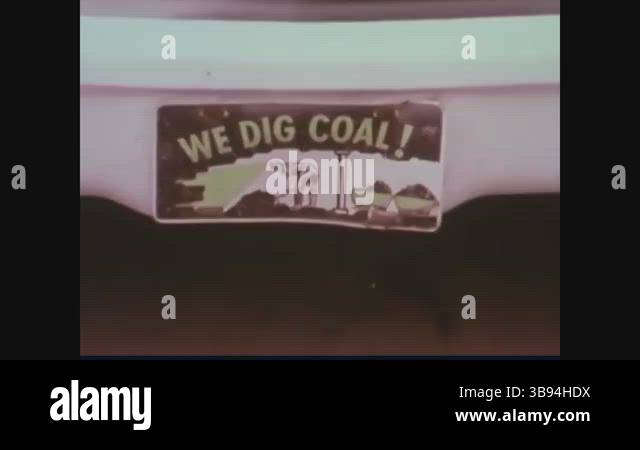 USA - 1970s - Trains carry coal from the mines while workers operate ...