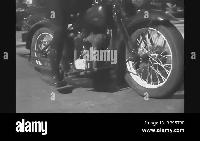 DETROIT - 1934 - Michigan State policeman with bike escorts the ...