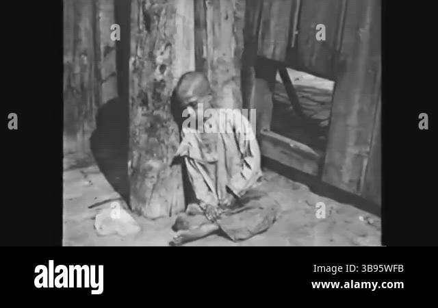 RUSSIA - 1921 - In the midst of the 1921 famine in the Volga region, aid workers tend to ...