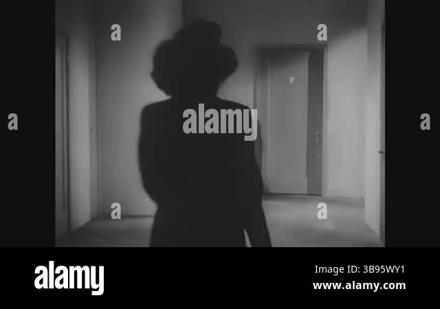 UNITED STATES - 1942 - Tommy and Betty observes students in the hallway ...