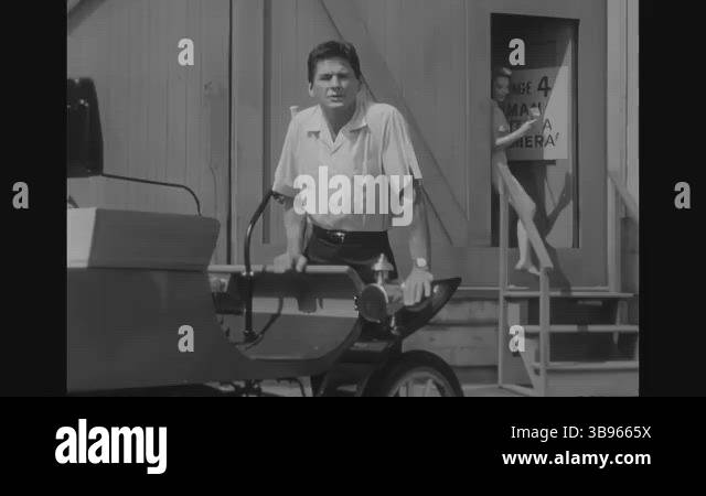 USA - 1959 - Charles Bronson drives his pretty co-star around the ...