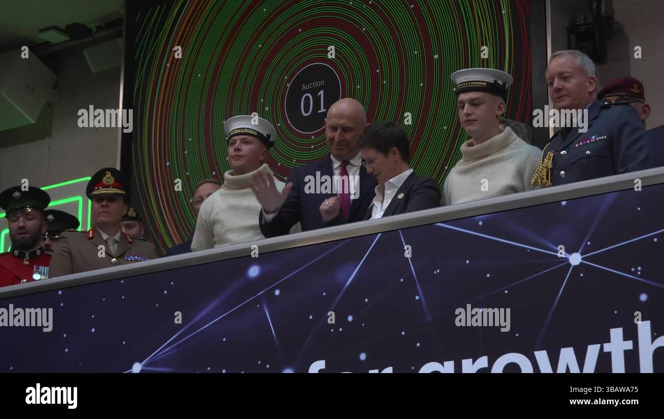 Defence Secretary John Healey closes the stock market at the London ...