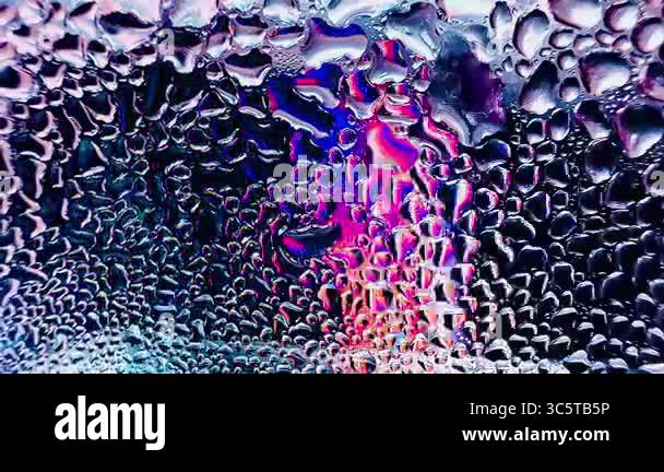 Close-up of water drops on metal surface in high resolution showing ...