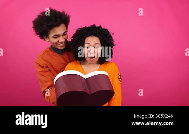 Young family enjoying romance and tenderness on a date. Close-up view ...