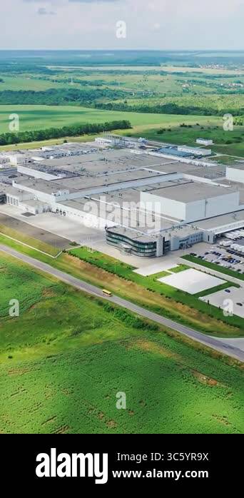 High above industrial factory. Aerial view of large factory and ...