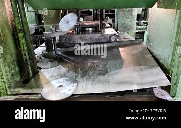 Process old-school industrial serial thick sheet steel stamping with ...
