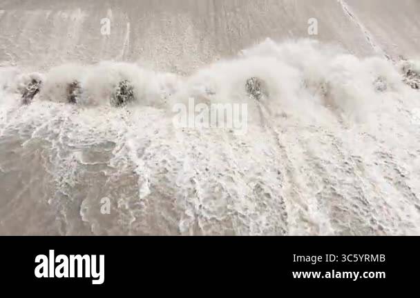 row of chute dentate blocks in concrete water spillway channel slope ...