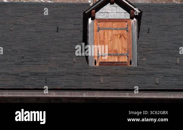 Here we have a detailed view showcasing a rustic roof that features a ...