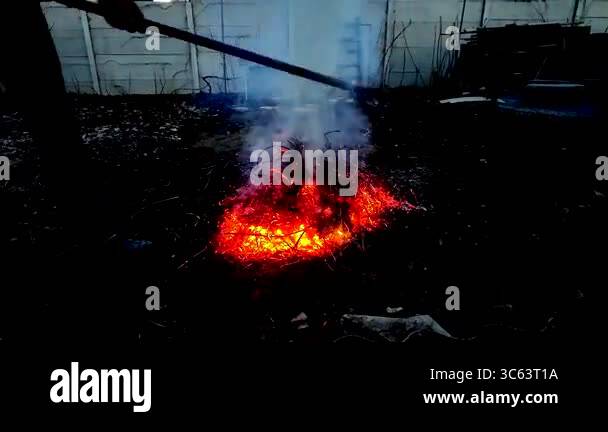 fire burning outside ash danger Stock Video Footage - Alamy