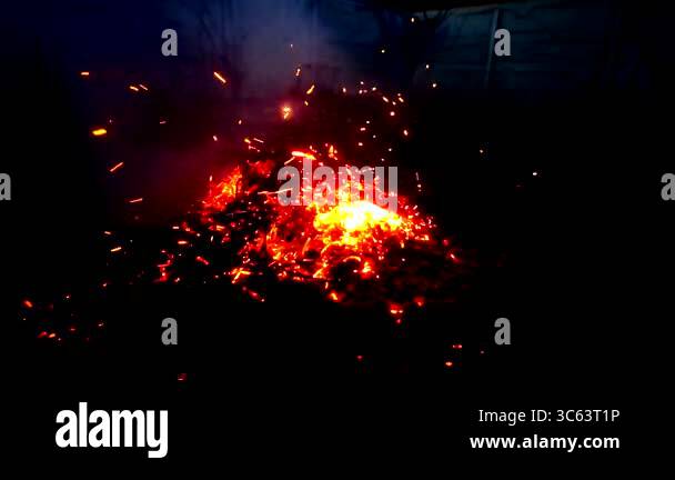 fire burning outside ash danger Stock Video Footage - Alamy