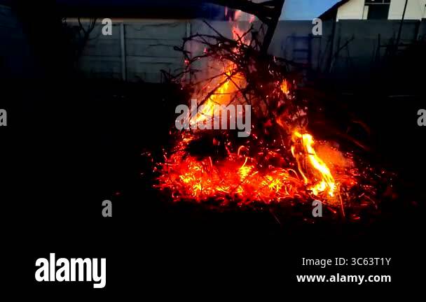 fire burning outside ash danger Stock Video Footage - Alamy