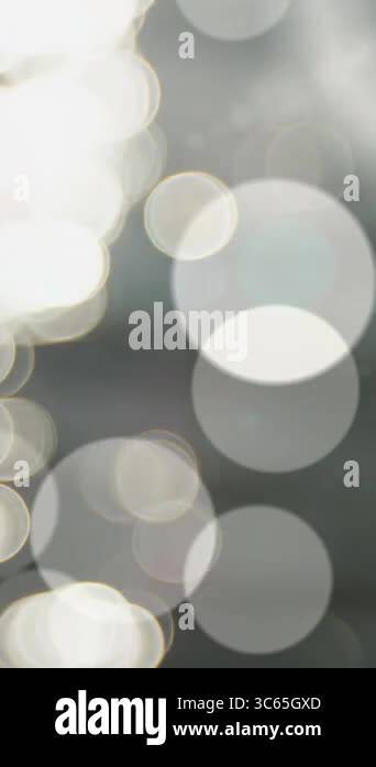 Animation of bokeh on lights on water. shadow, pattern and colour ...