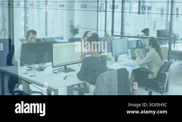 In office, people working at desks with currency exchange rates ...