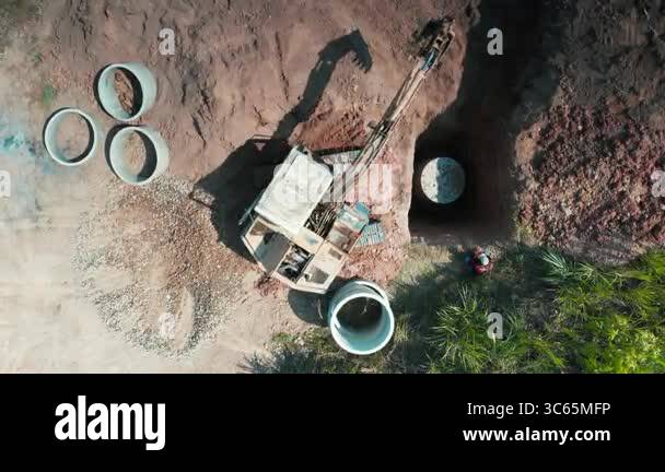 Backhoe machine equipment and soil work in top view. Construction by ...