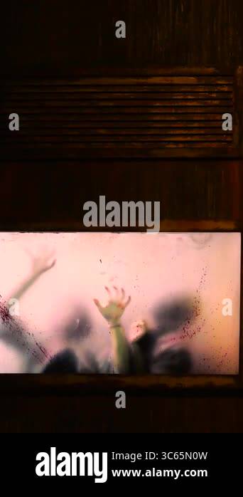 Vertical screen, several undead figures are trapped behind a frosted ...
