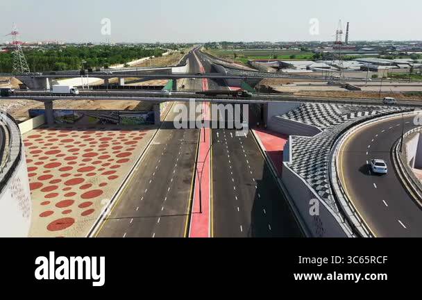 Drone over a road bridge with passing cars. Aerial View Stock Video ...