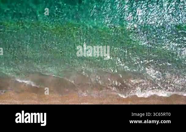 Top-down aerial drone view of paradise sandy beach and crystal clear ...