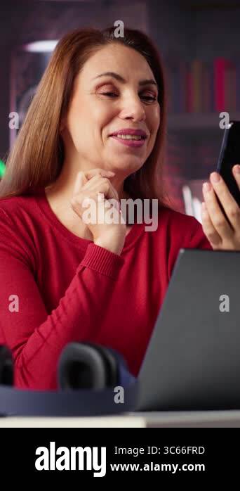 Vertical Video Woman freelancer taking online course to develop new skills from home office ...