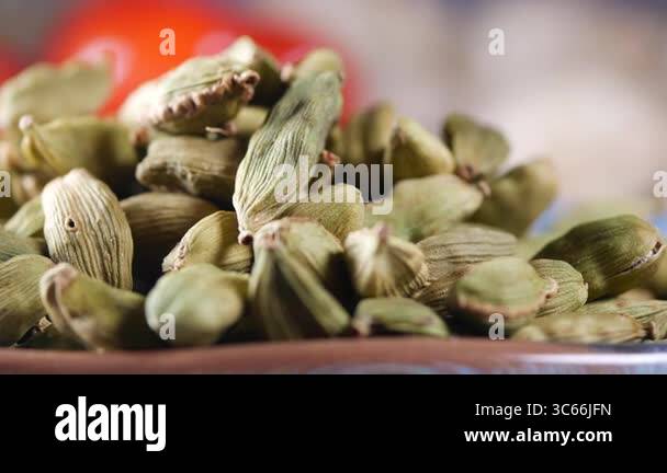 Discover the unique aroma and uses of green cardamom in cooking Stock ...