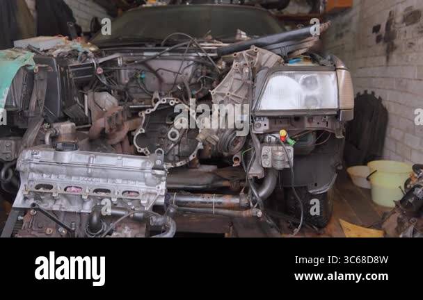 detailed engine disassembly, revealing complex mechanical components in ...