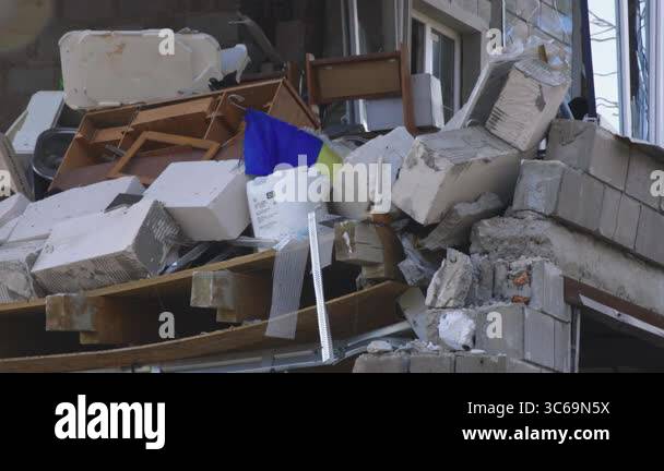 Consequences of military actions, destroyed building, close-up. Damage ...